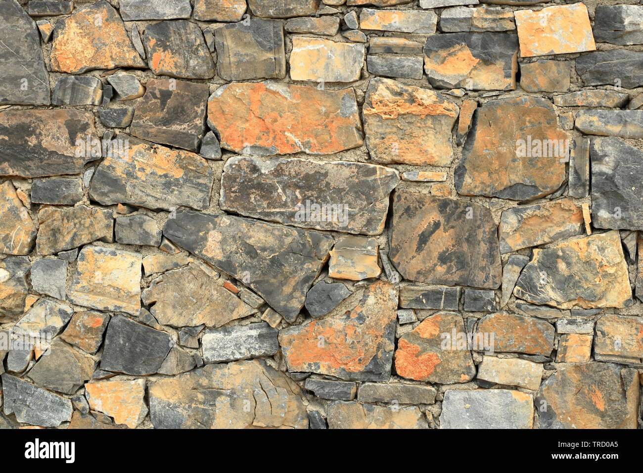 Big gray wall made from stone bricks Stock Photo - Alamy