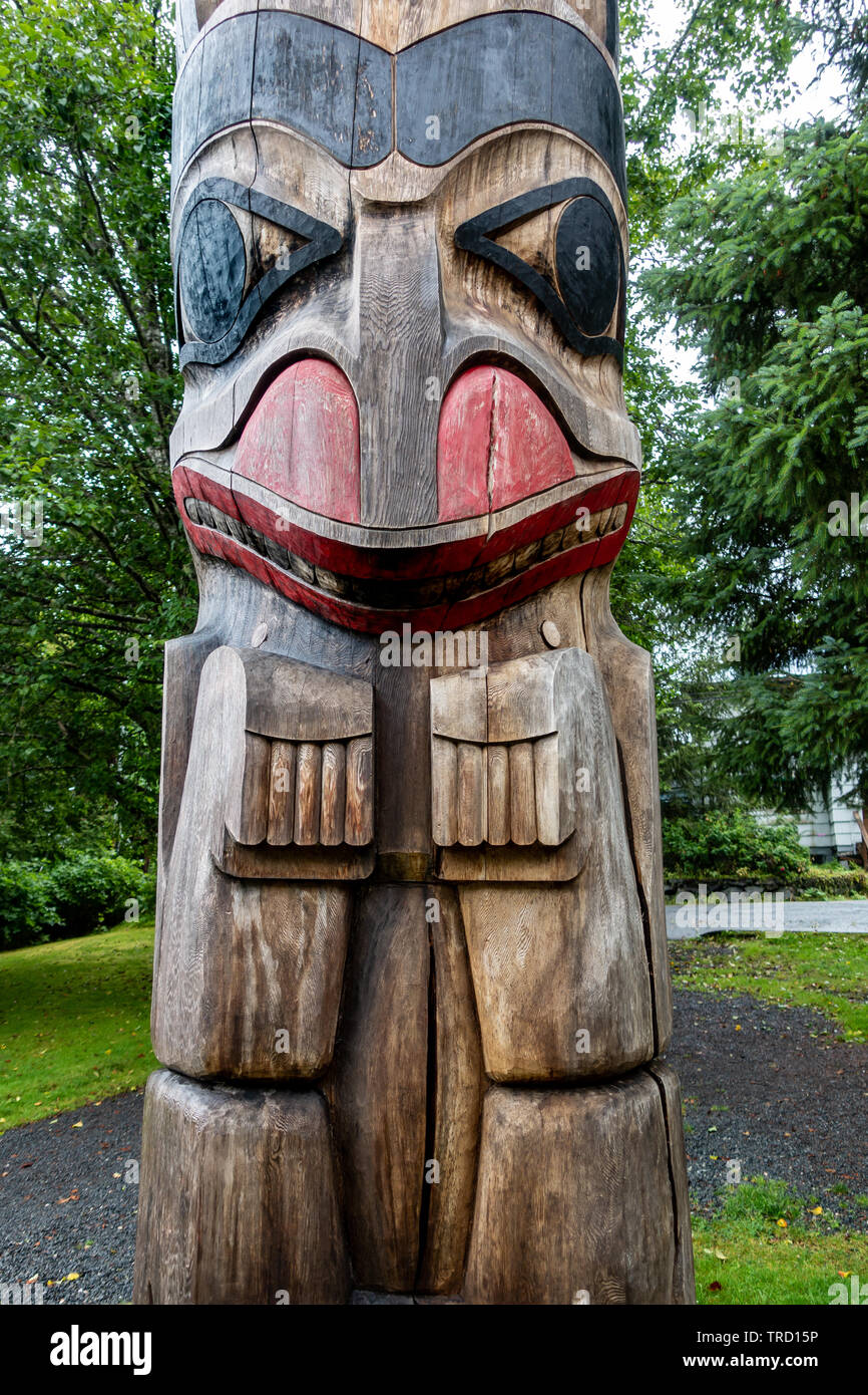 Traditional Totem Poles located in Sitka National Historical Park in ...