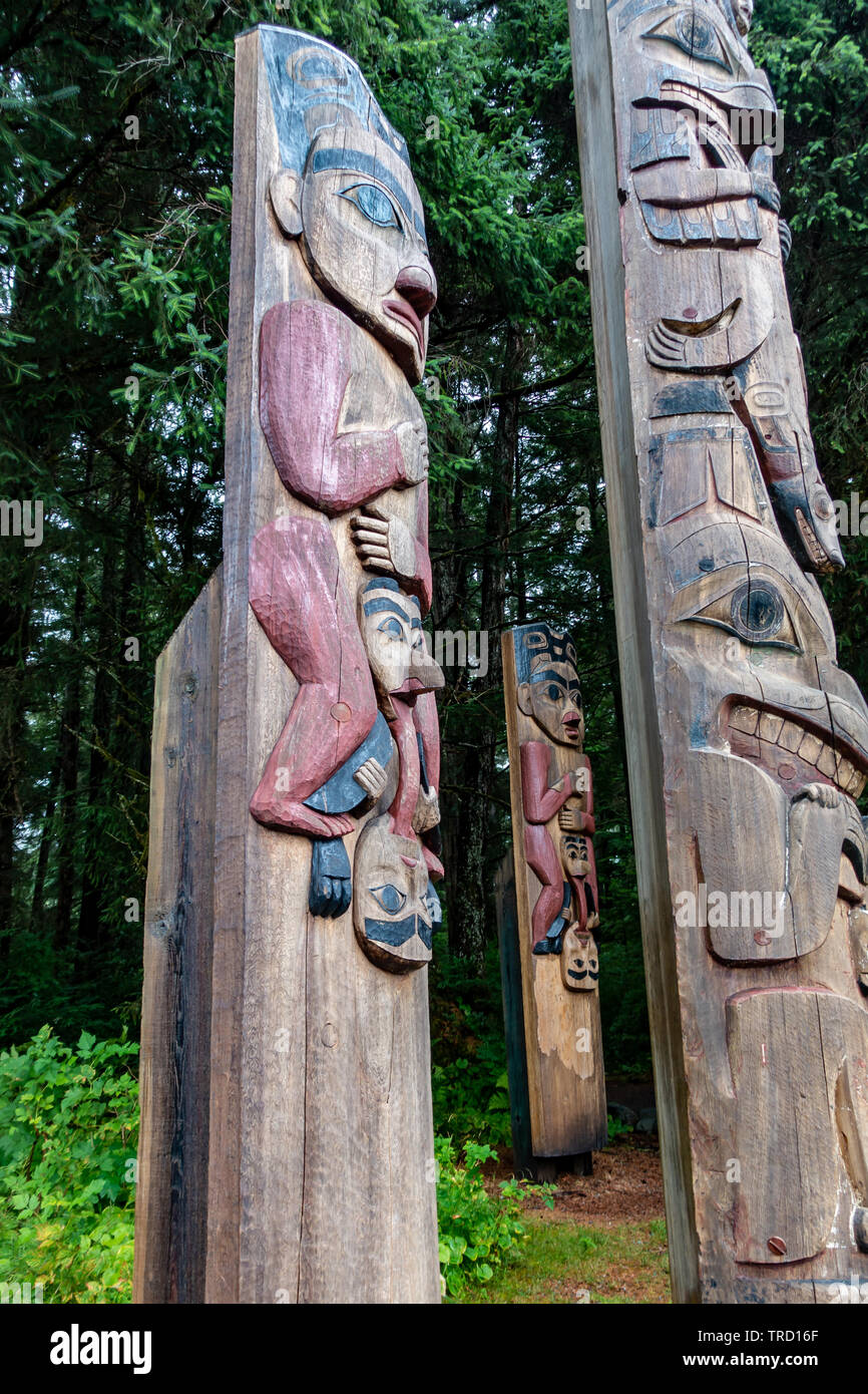 Traditional Totem Poles located in Sitka National Historical Park in ...