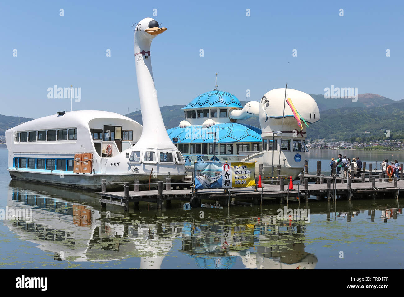 SUWA, JAPAN - May 25, 2019: Suwa Lake - tourist go by swan boat to ...
