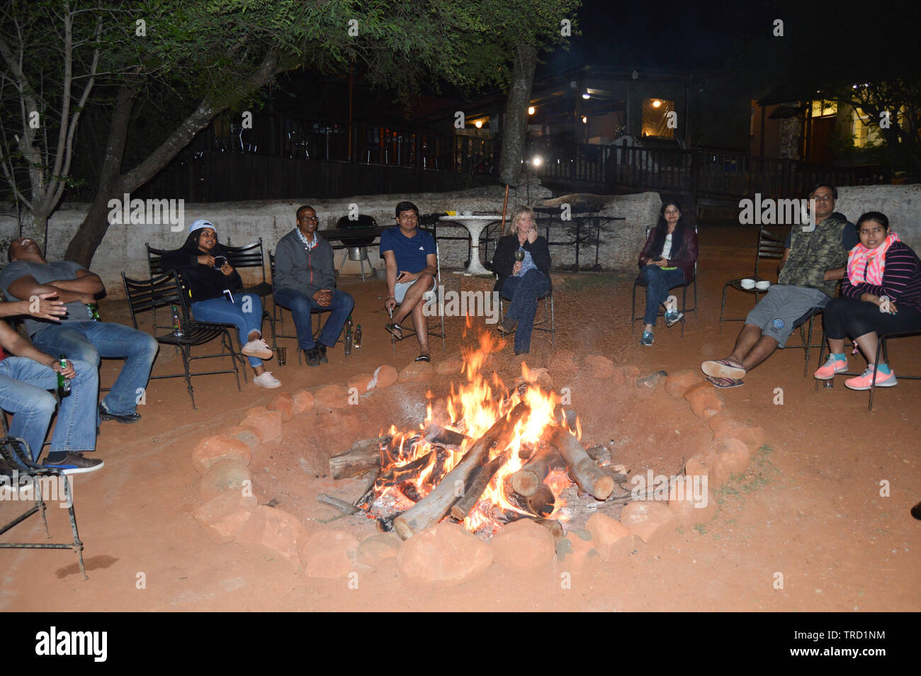 People Around A Bonfire Stock Photos & People Around A Bonfire Stock ...
