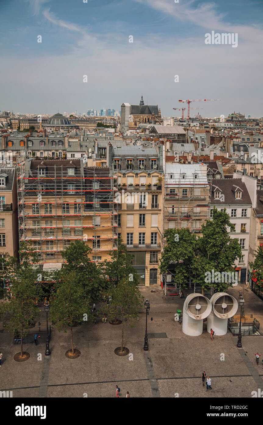 Buildings in square and cranes seen from the Center Georges Pompidou in ...