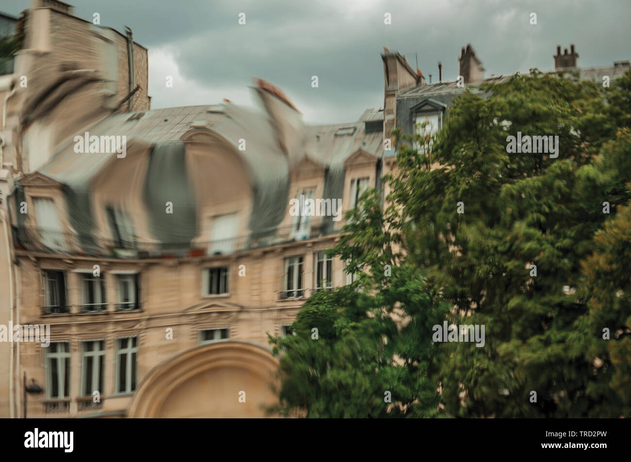 Buildings with natural distortions caused by real deformations in ...