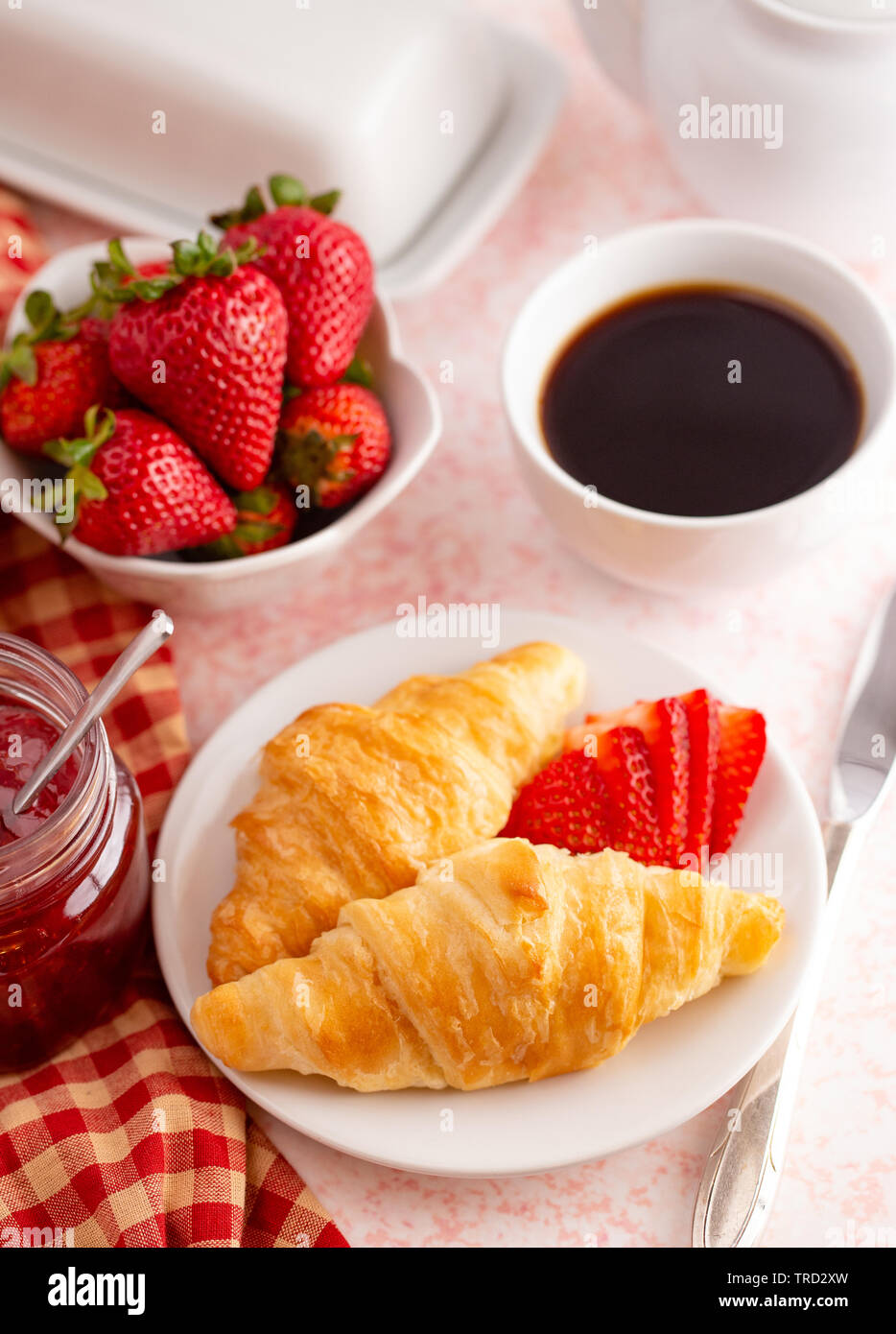 Table Set for Breakfast with Croissants Strawberries and Coffee Stock ...