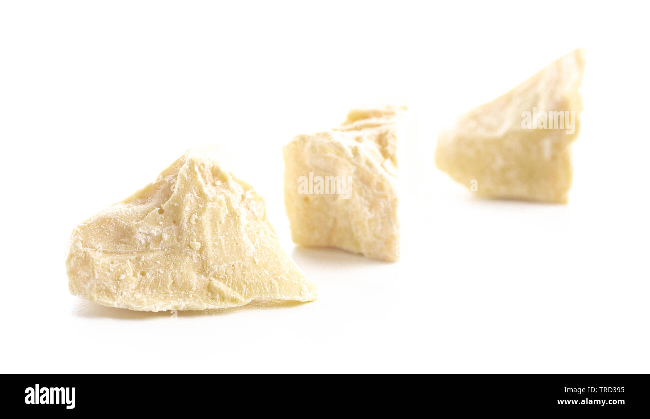 Chunks of Raw Organic Cocoa Butter Isolated on a White Background Stock ...