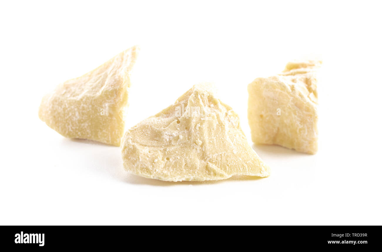 Chunks of Raw Organic Cocoa Butter Isolated on a White Background Stock ...