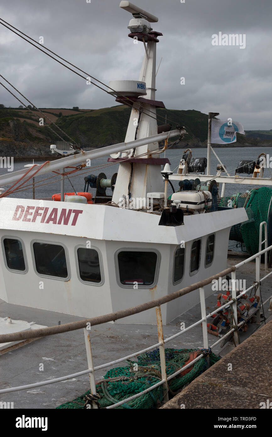 Defiant Fowey fishing boat with Brexit Party flag at Mevagissey ...