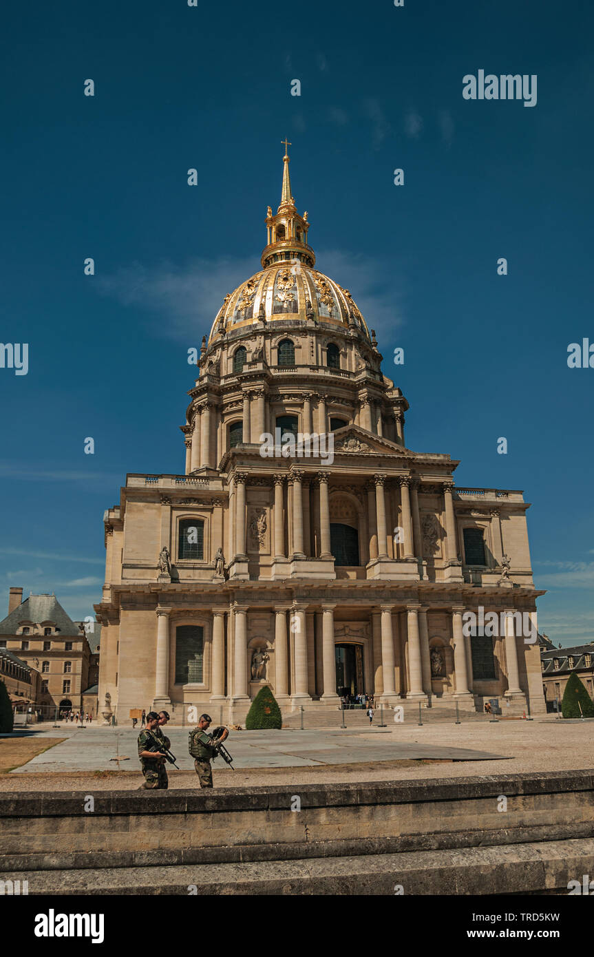 Guard soldiers in front of Les Invalides Palace in a sunny at Paris ...