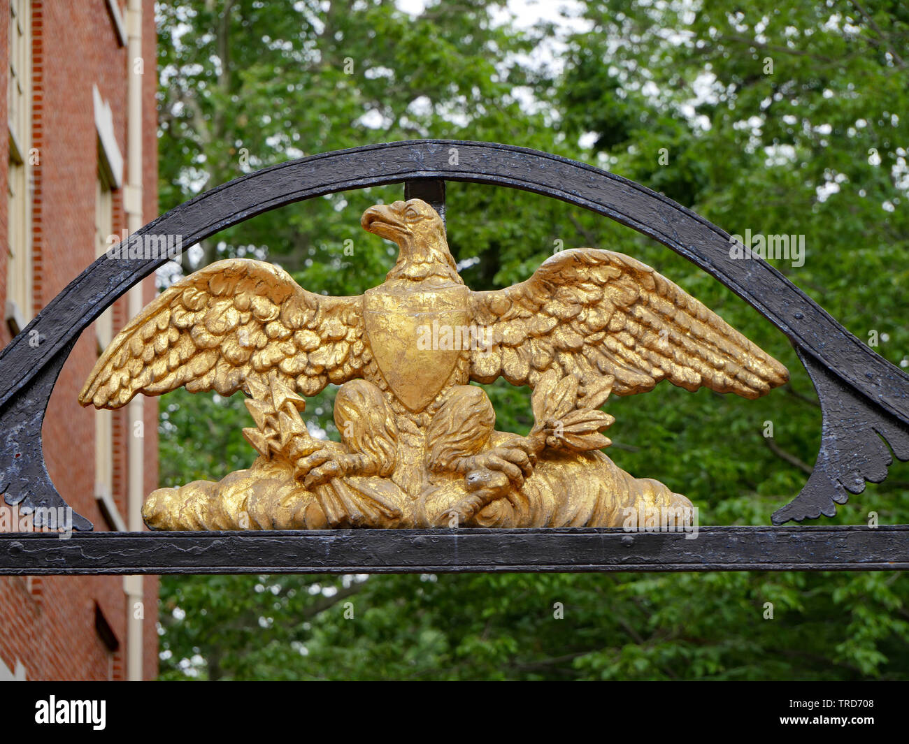 American eagle symbol, engraving above a gate Stock Photo - Alamy