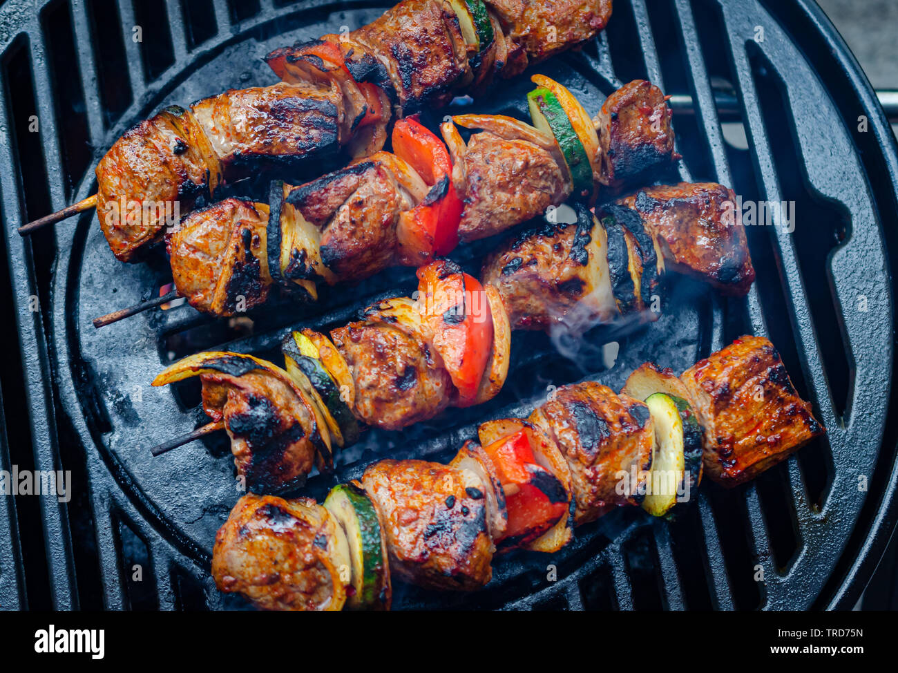Barbecuing hi-res stock photography and images - Alamy
