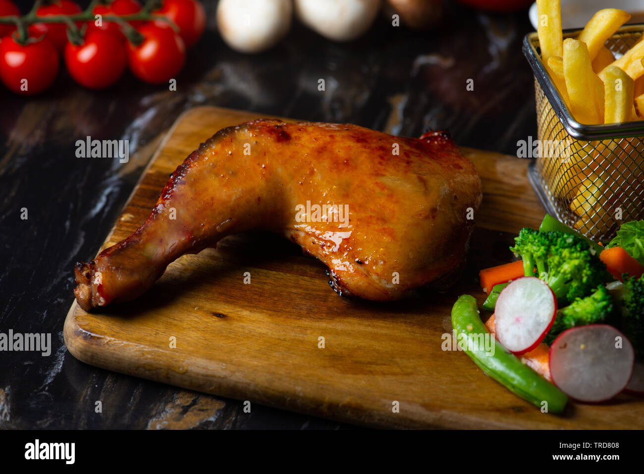 roast drum stick on cutting board Stock Photo - Alamy