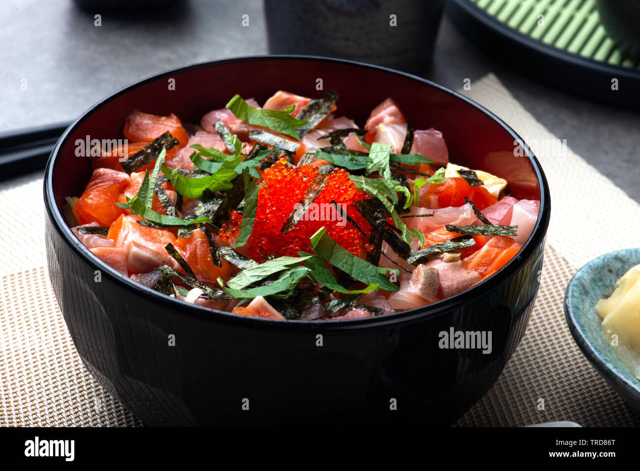 Salmon Don a bowl of rice with sashimi on top Stock Photo - Alamy