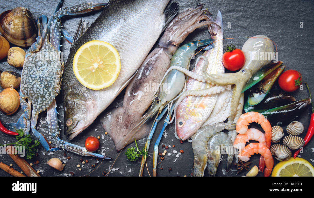 Seafood plate with Shellfish shrimps prawns crab shell cockles mussel ...