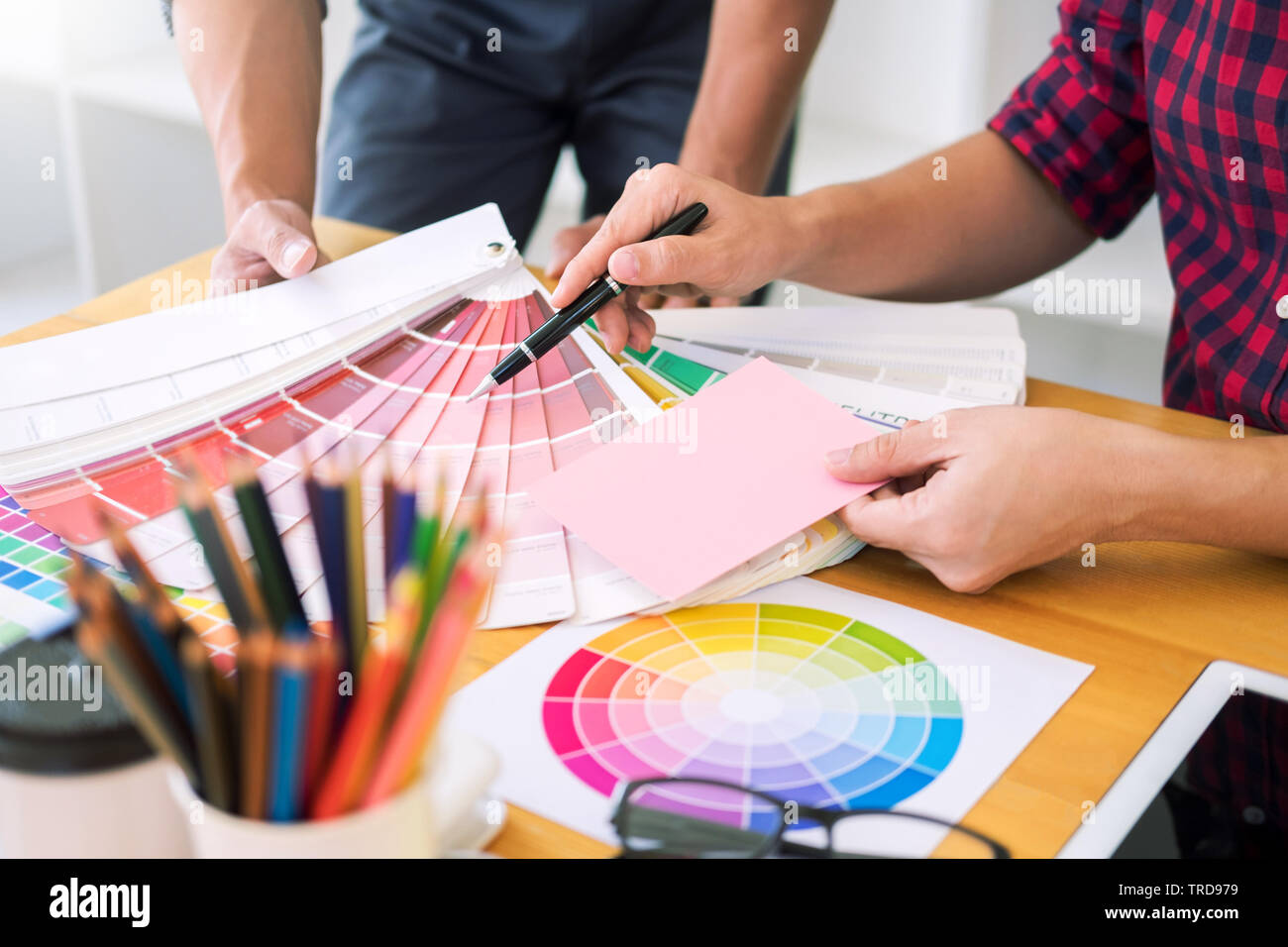 team Web designer working drawing something on graphic computer in the ...