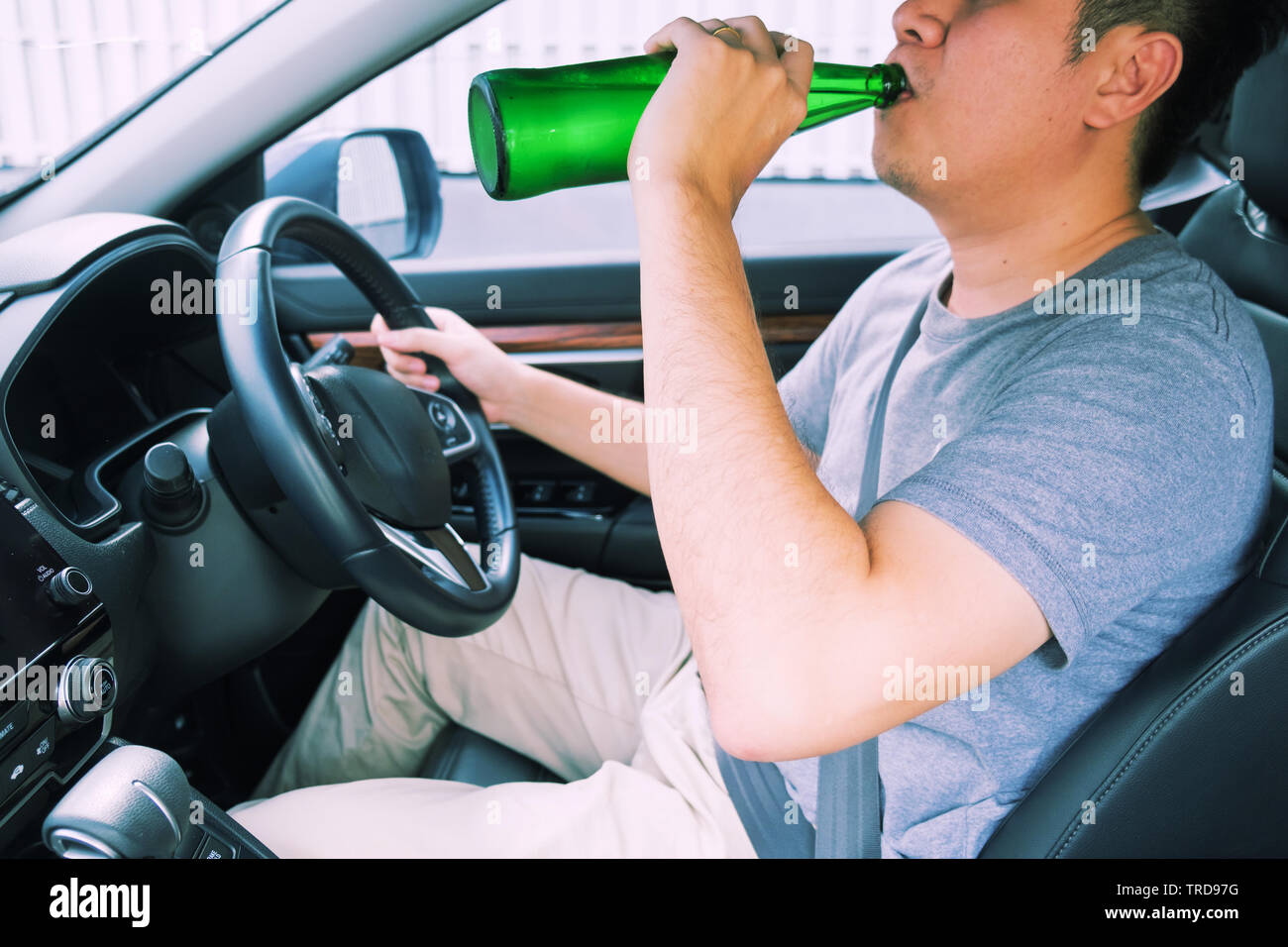 Illustration man driving car drunk hi-res stock photography and images ...