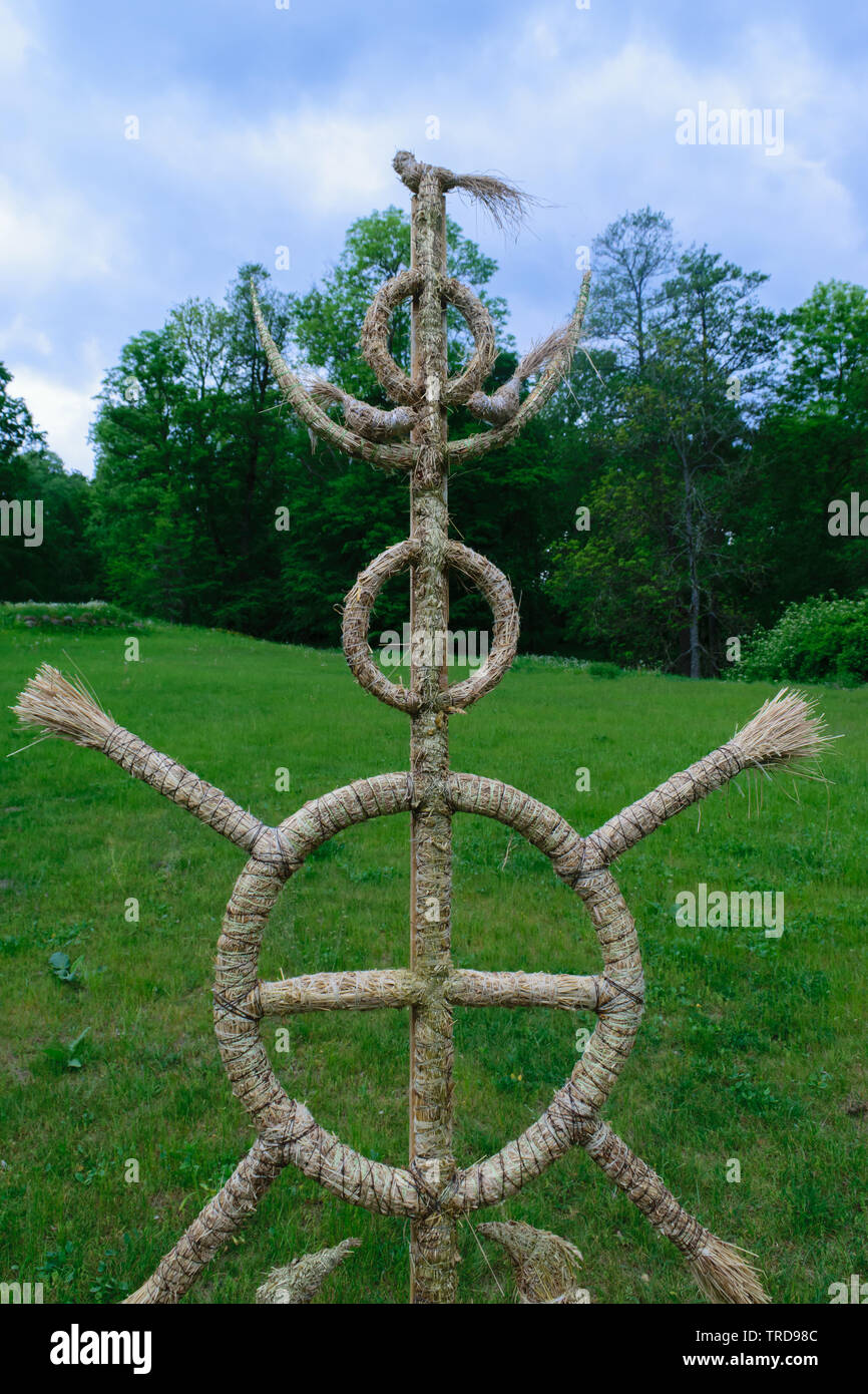 Baltic mythology gods symbol made from straws standing in the green ...