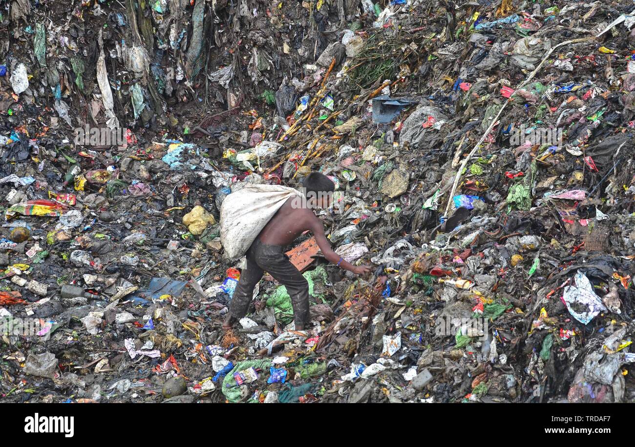 DIMAPUR, India. 04th June, 2019. An Indian rag picker search for re ...