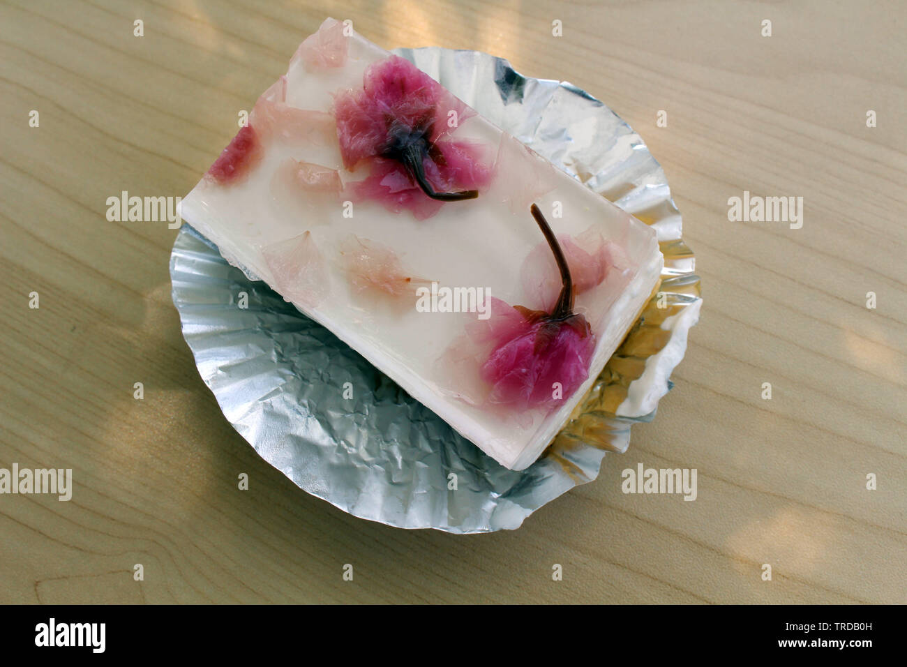 A piece of tart cake made of pink sakura in Japan. Delicious! Stock ...