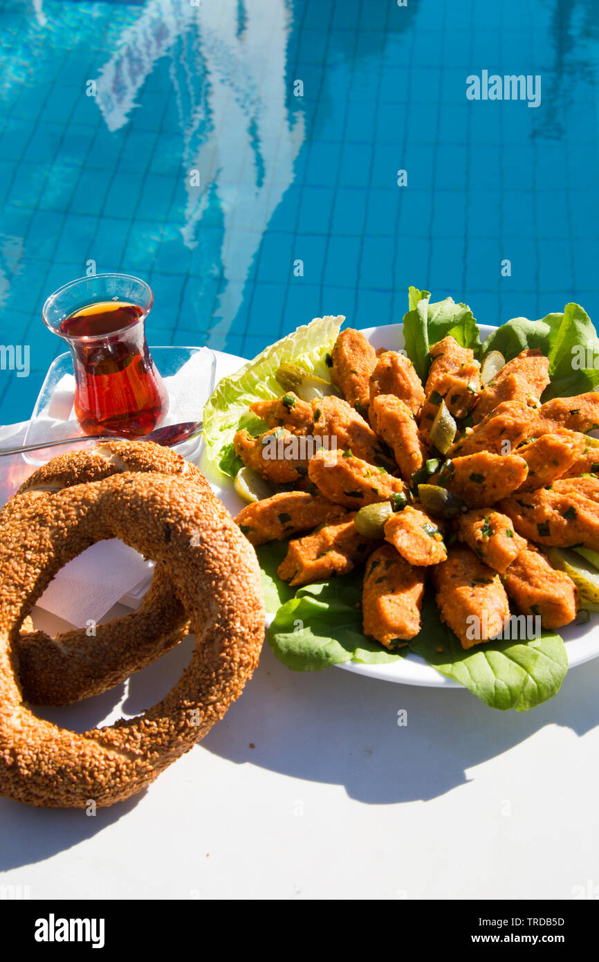 Traditional Turkish afternoon snack of Bulgar wheat and red lentil ...