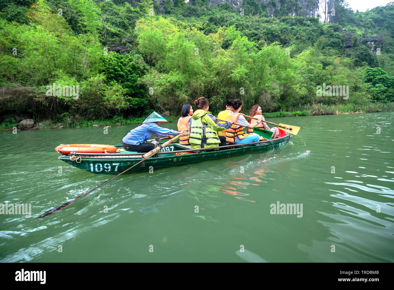 Tourists leaving marina travel to visit Ecotourism the natural ...