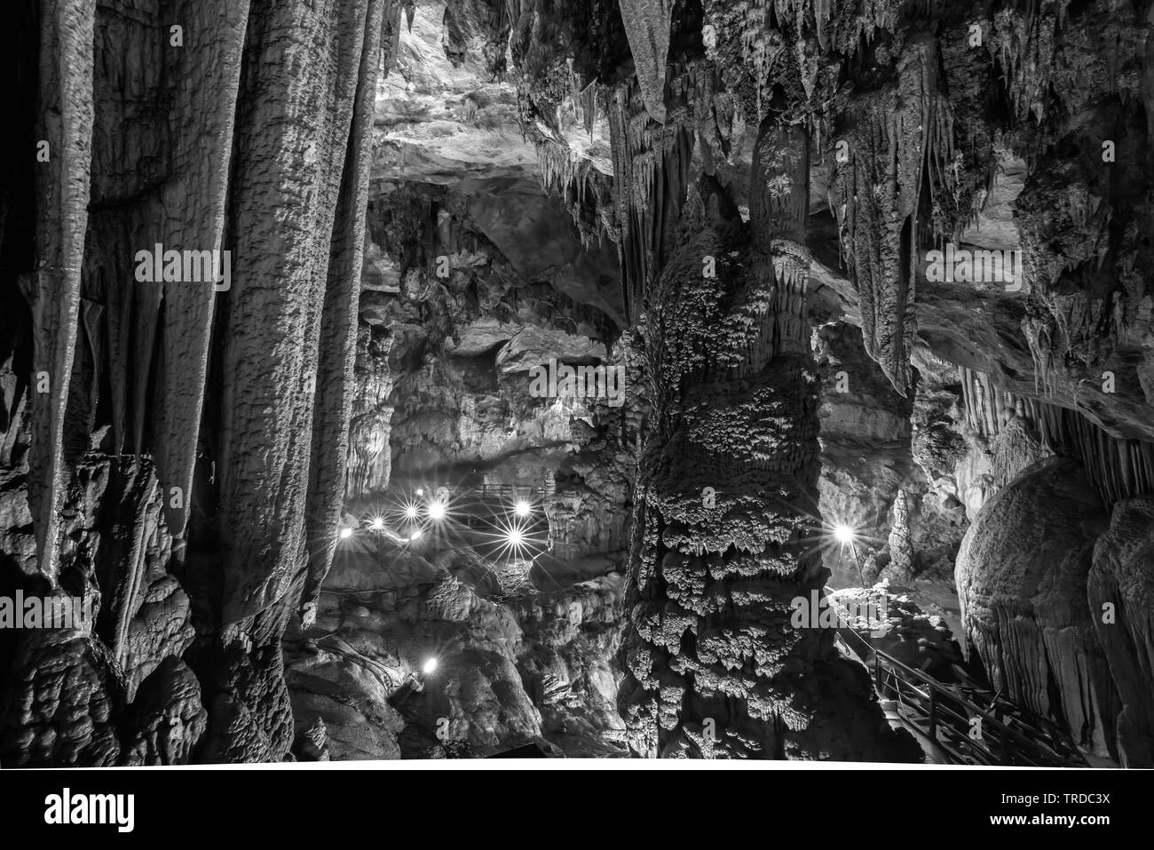Cave-shaped limestone geological formations with beautiful stalactites ...