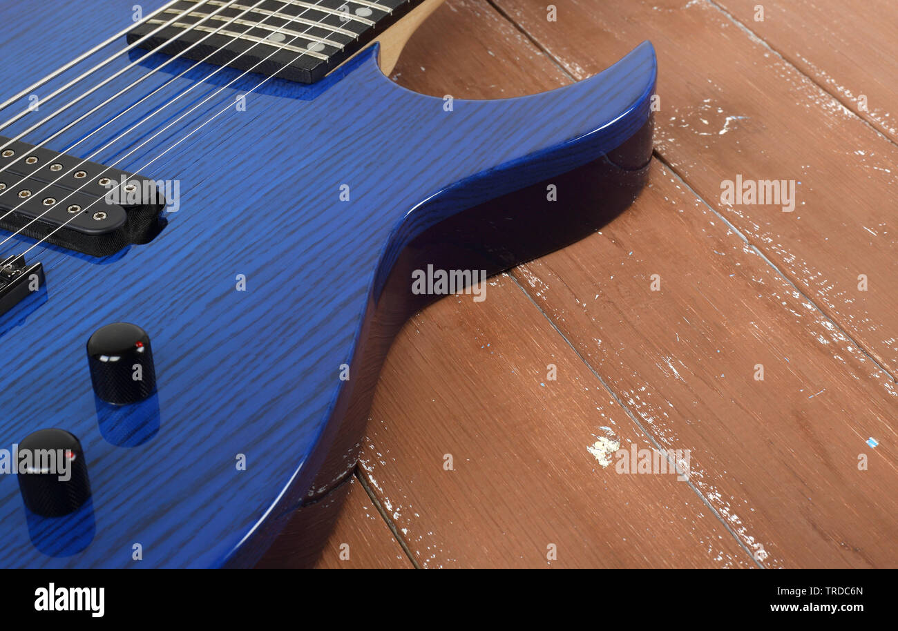 Musical instrument - Fragment 8-string blue electric guitar solid-body ...