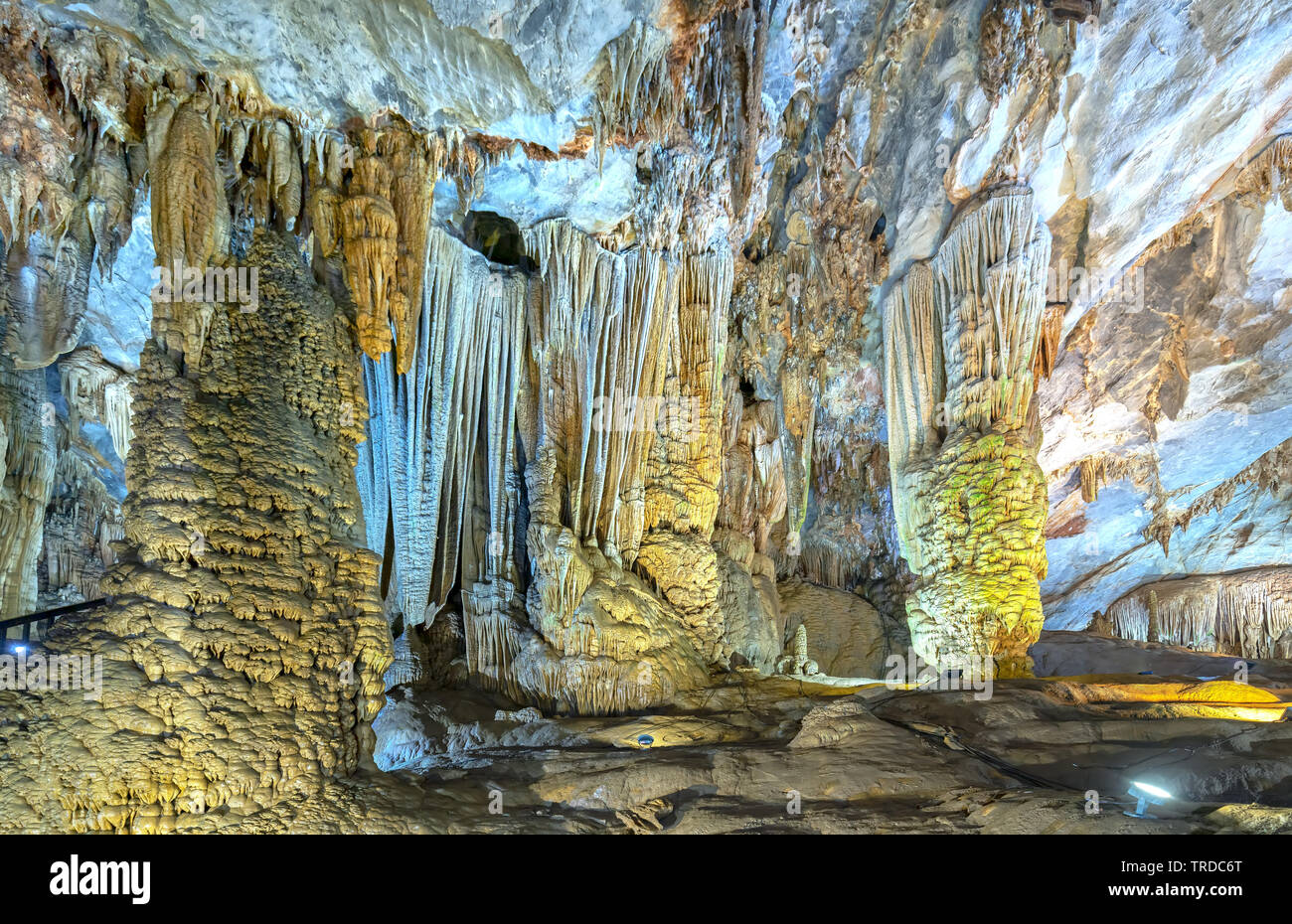 Tourists visit on wooden walkway through scenic natural corridor ...