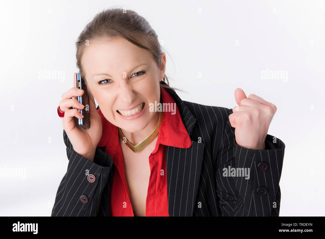 Portrait of a young likeable Business woman with one hand clenched to a ...
