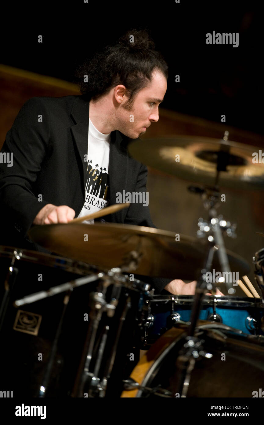 Musician man playing drums indoors hi-res stock photography and images ...