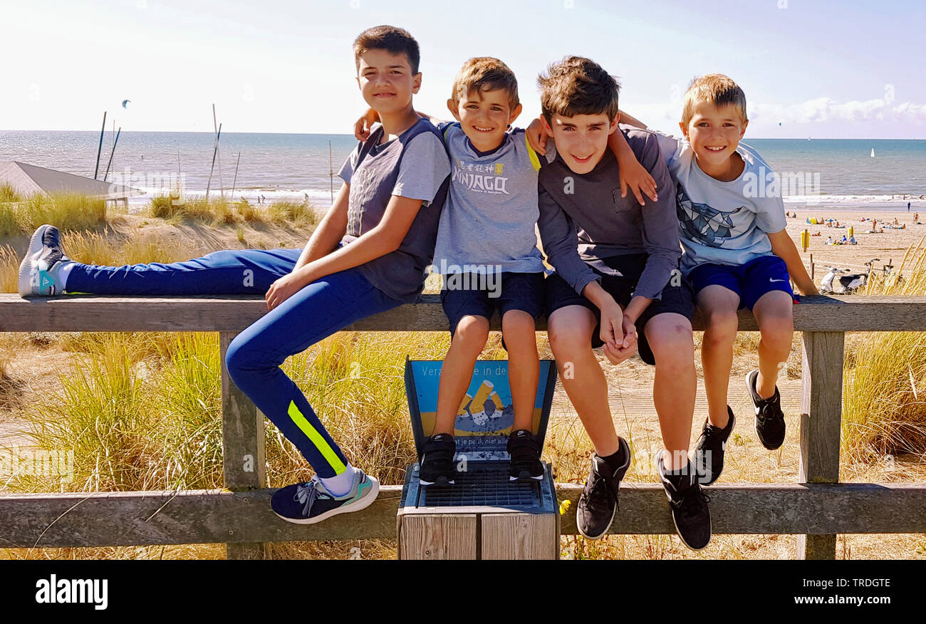 Four boys hi-res stock photography and images - Alamy