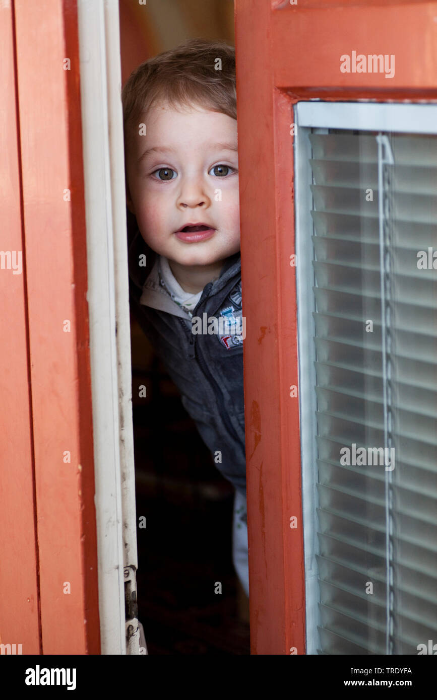 Child opening door for person hi-res stock photography and images - Alamy