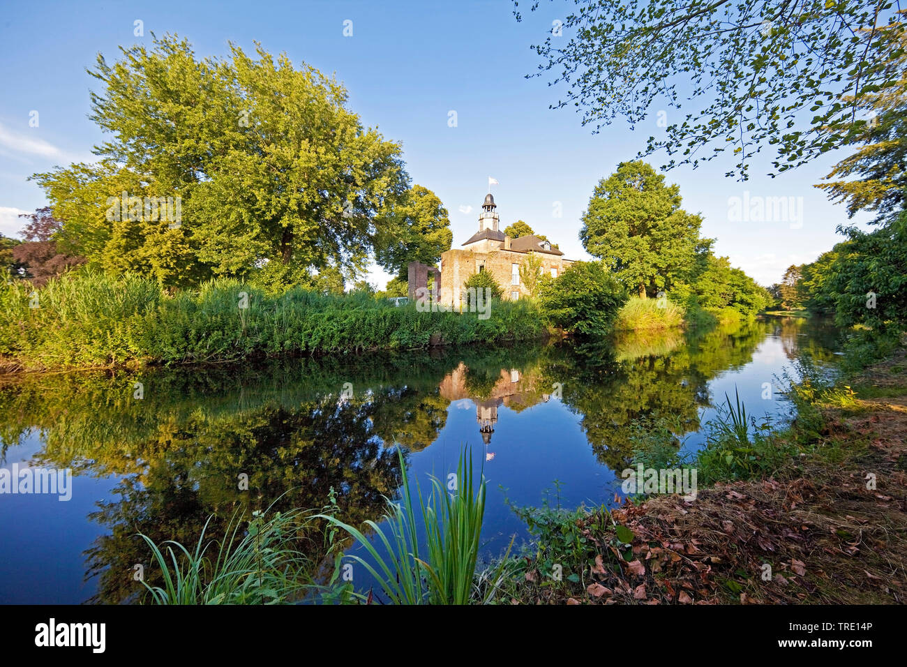 river Niers with Hertefeld castle in Weeze, Germany, North Rhine ...