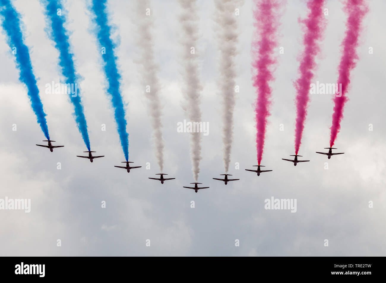 air shows, airplanes at the sky with condensation trails in the colours ...
