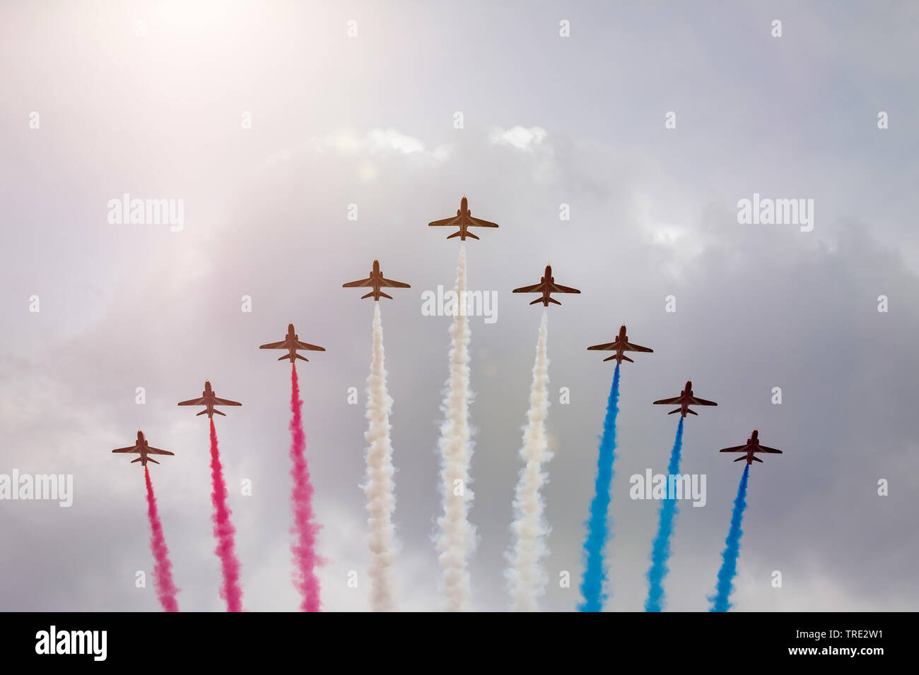 air shows, airplanes at the sky with condensation trails in the colours ...