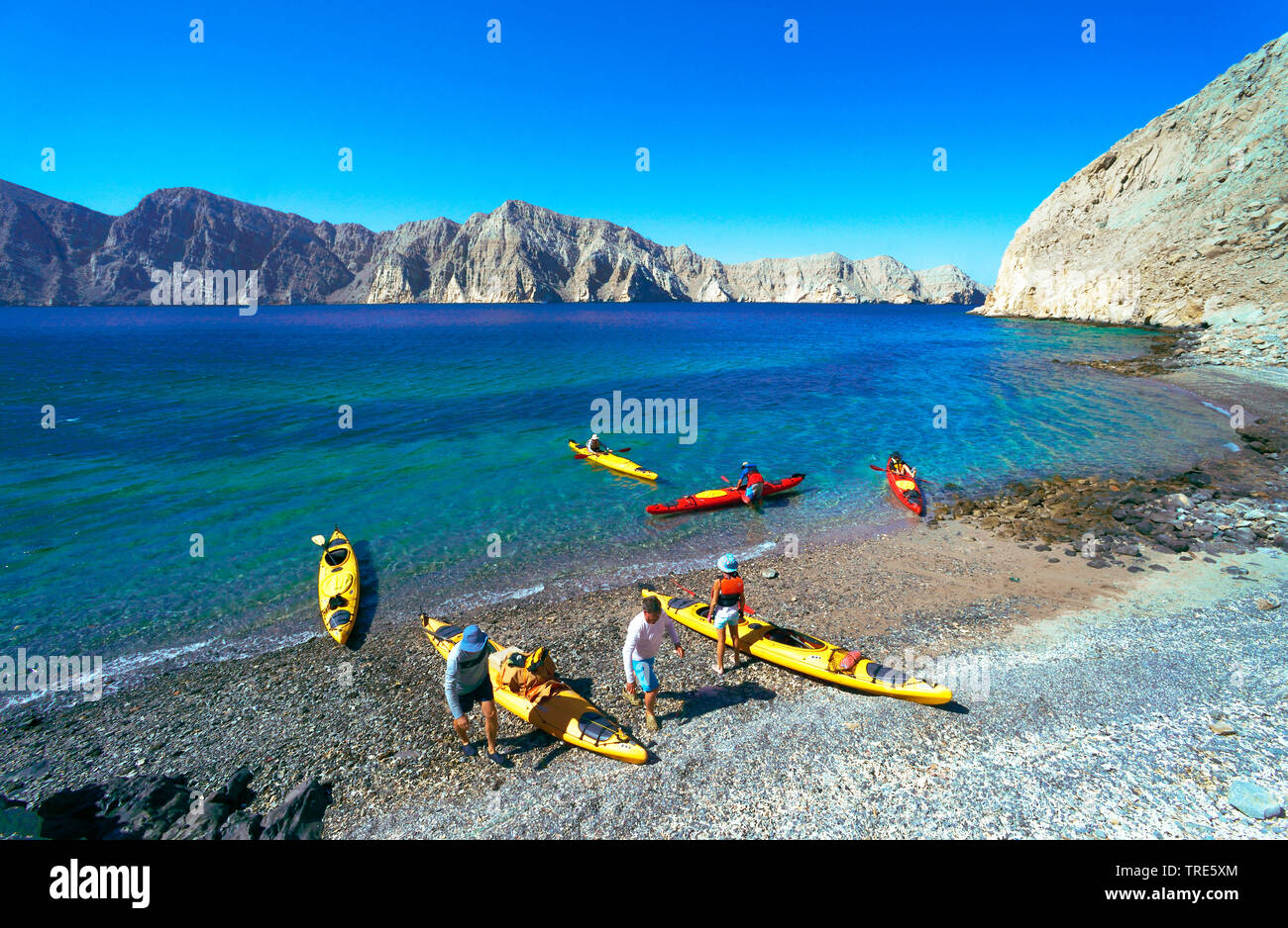 sea kayaking in bay of Sham in the Strait of Hormuz, Oman, Musandam ...