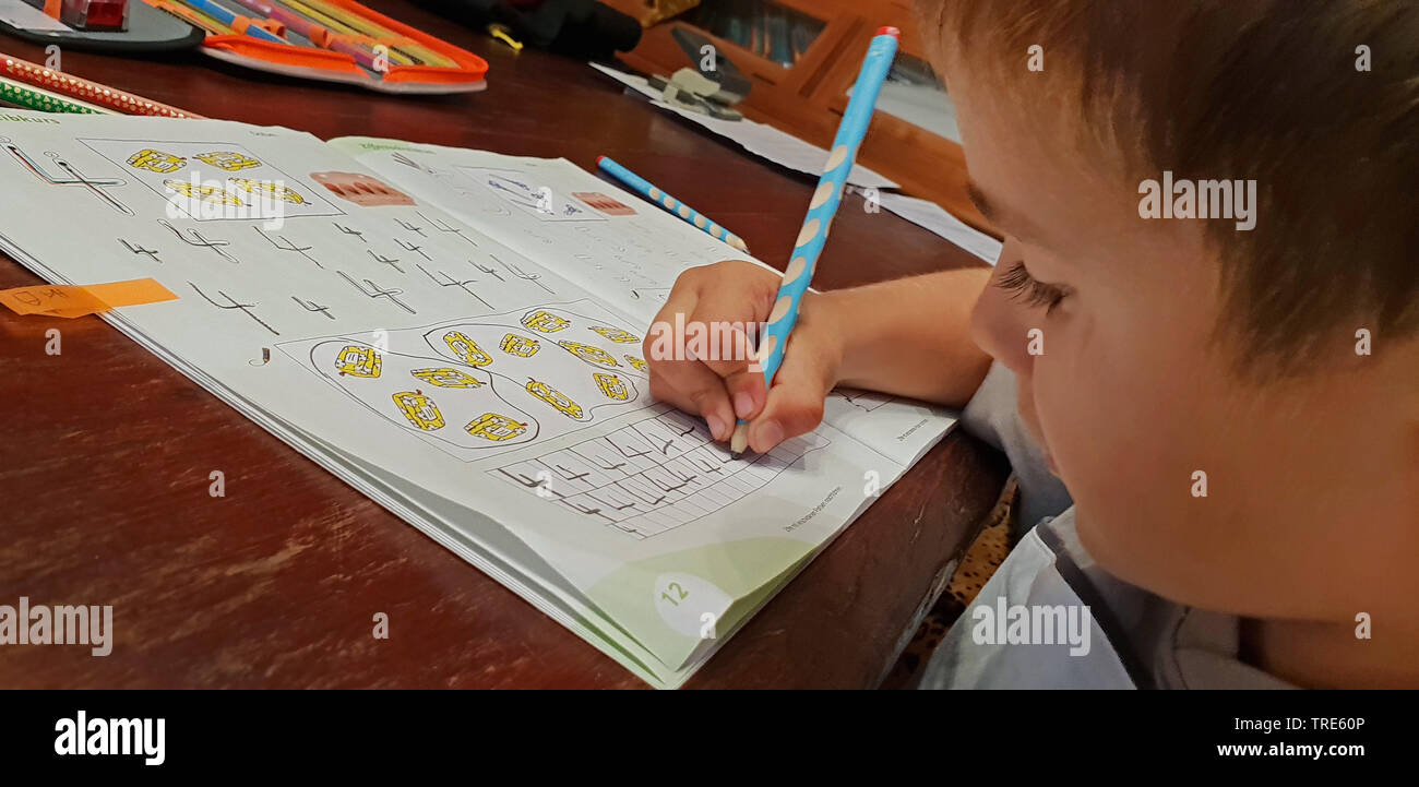 little boy lerning the number 4, Germany Stock Photo - Alamy