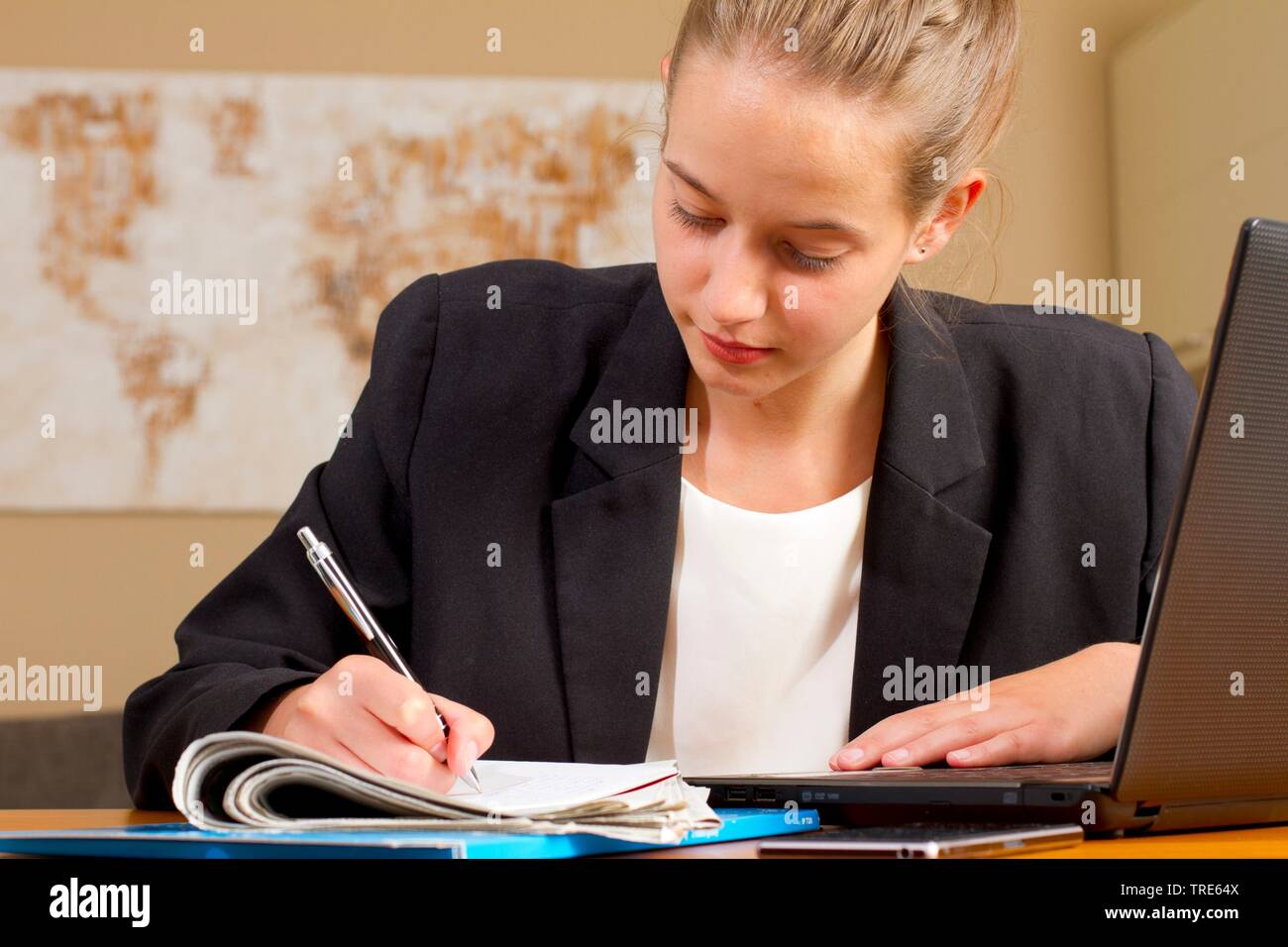 Working at a desk hi-res stock photography and images - Alamy