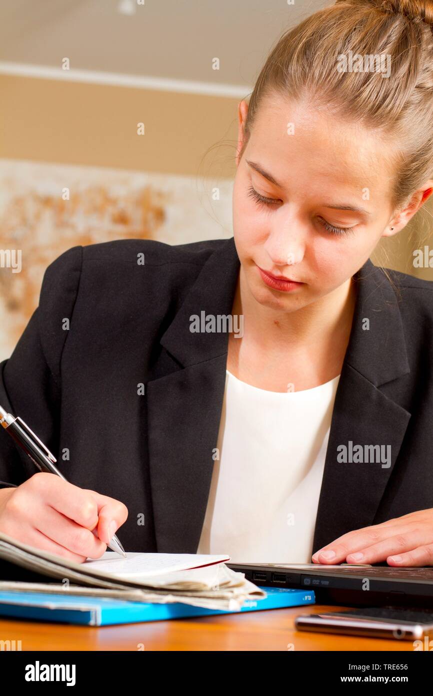 Working at a desk hi-res stock photography and images - Alamy