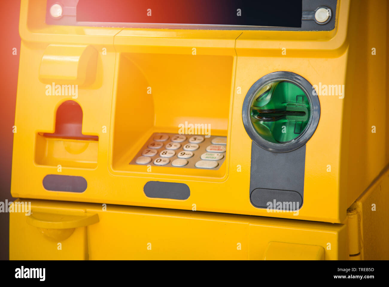 ATM - Automated teller machine yellow close up Stock Photo - Alamy