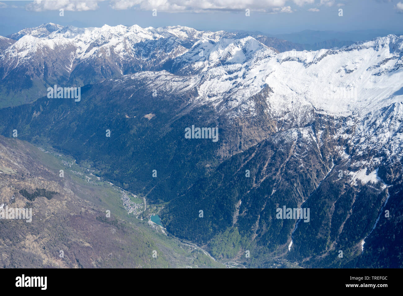 aerial, from a small plane, of Anzasca valley in Ossola mountains, shot ...