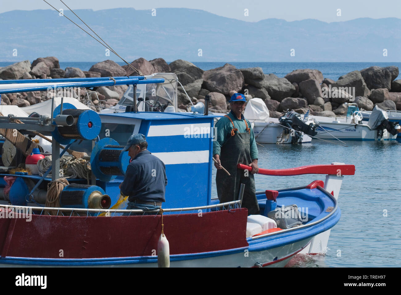 Two men fishing in a boat hi-res stock photography and images - Alamy