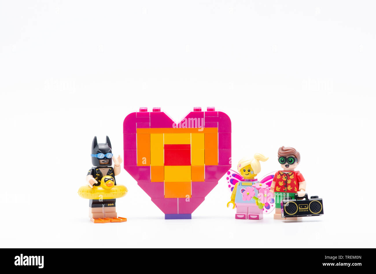 lego batman with butterfly girl and robin and piece offering heart ...