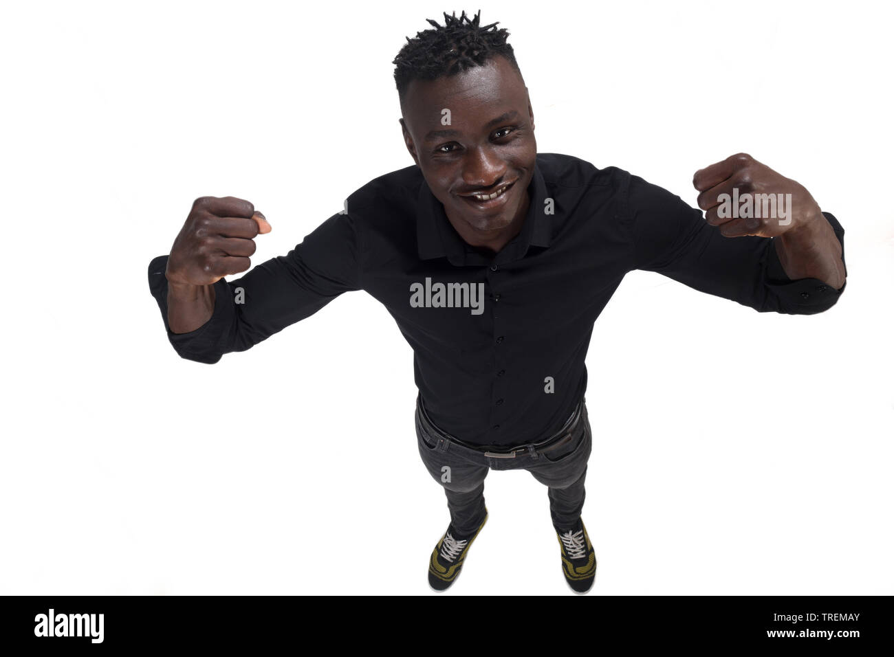 man doing strength on a white background Stock Photo - Alamy
