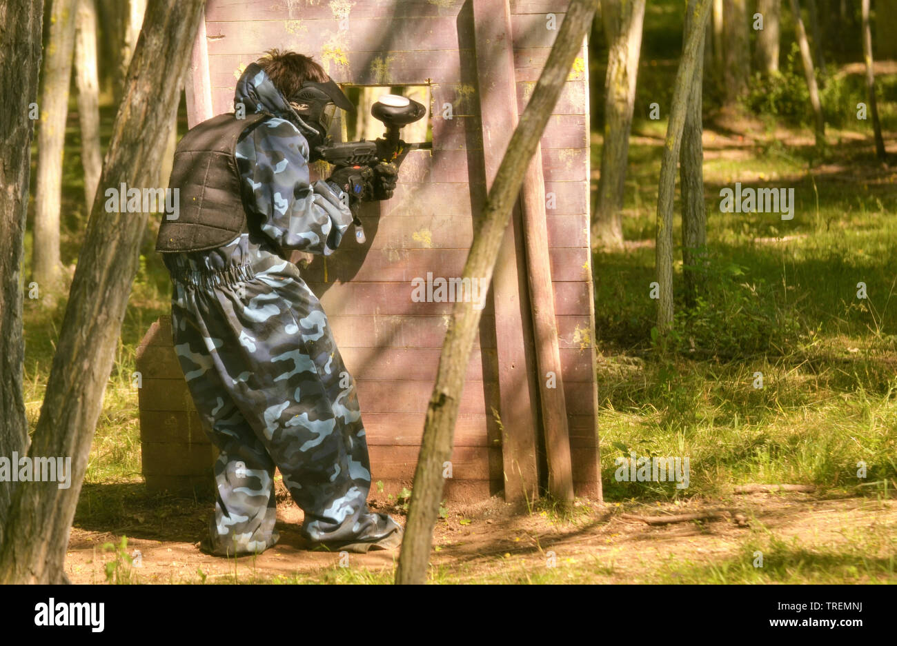 Paintball battle. The battlefield is equipped with barriers: they allow ...