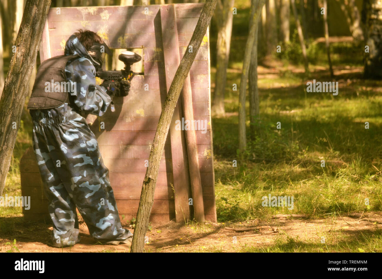 Paintball battle. The battlefield is equipped with barriers: they allow ...