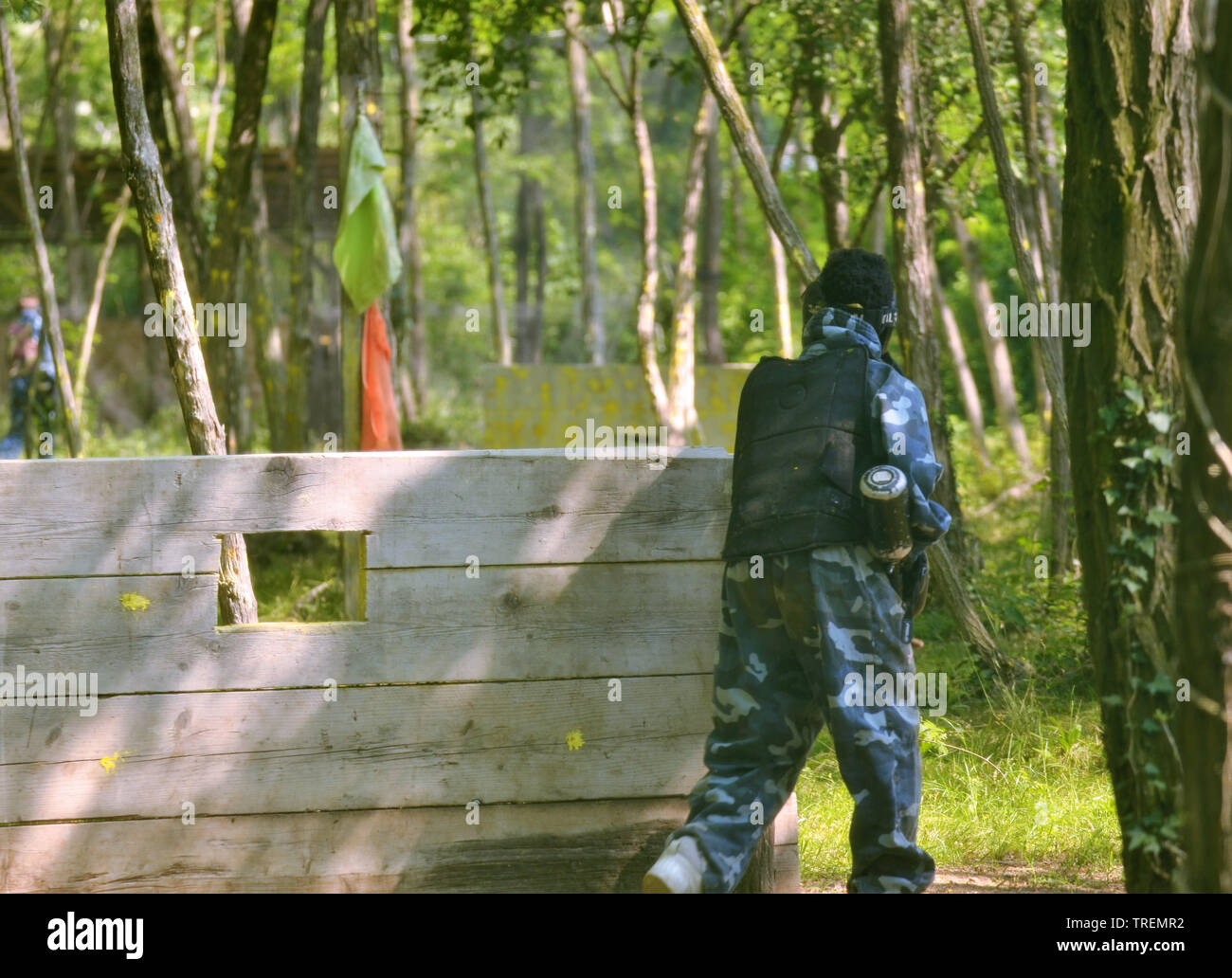 Paintball battle. The battlefield is equipped with barriers: they allow ...