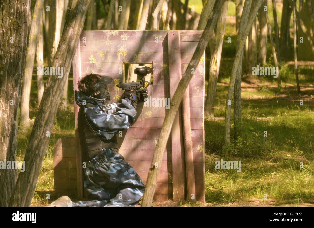 Paintball battle. The battlefield is equipped with barriers: they allow ...