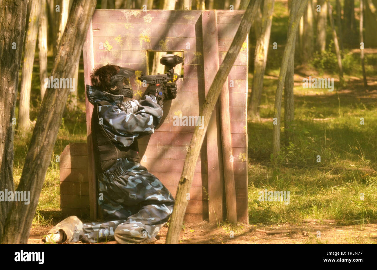 Paintball battle. The battlefield is equipped with barriers: they allow ...