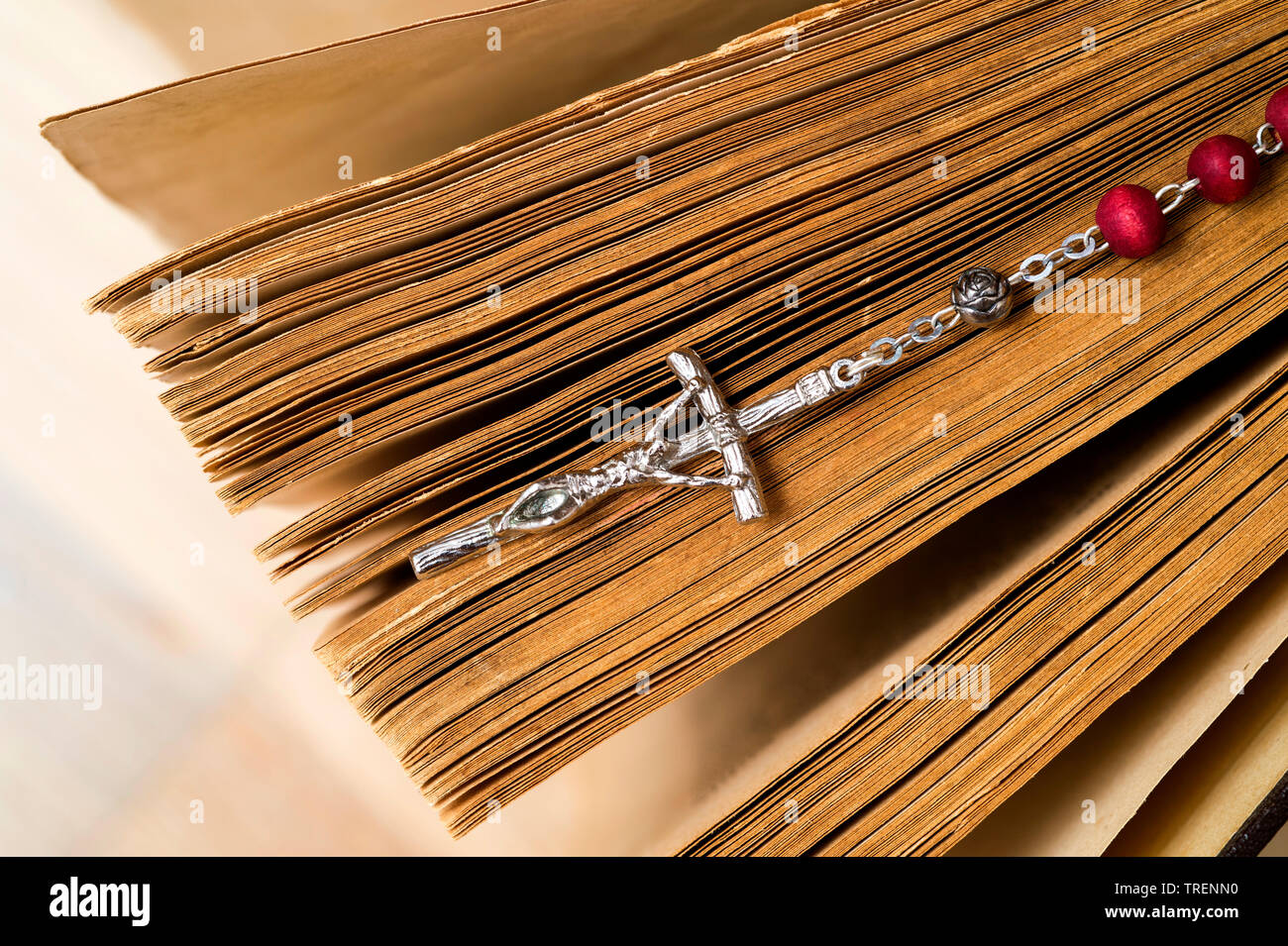Cross on the Bible on a wooden background. Holy book Stock Photo - Alamy