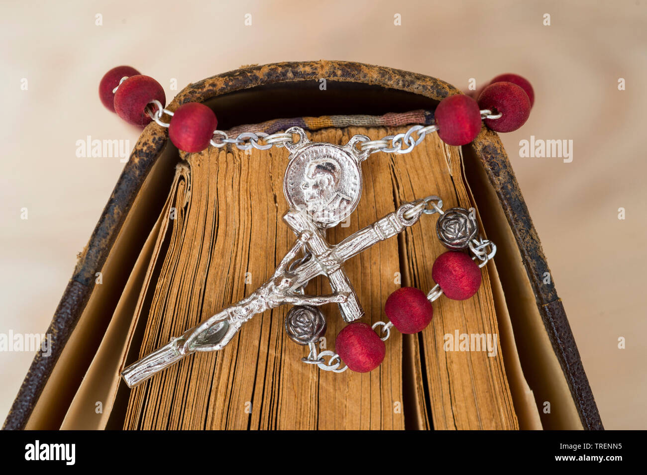 Cross on the Bible on a wooden background. Holy book Stock Photo - Alamy